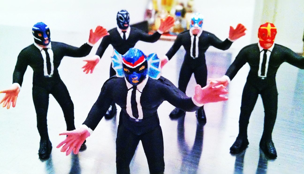 Nick Lowe Rassled by Los Straitjackets - News Leak - Stomp And Stammer